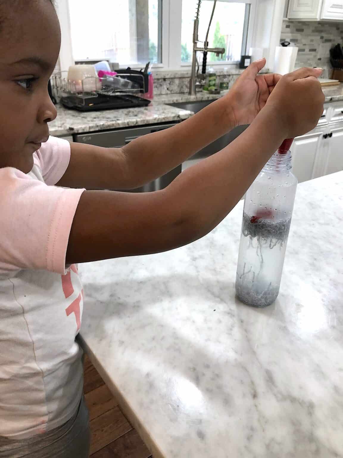 How To Make An Easy No-Dye Galaxy Sensory Bottle For Kids
