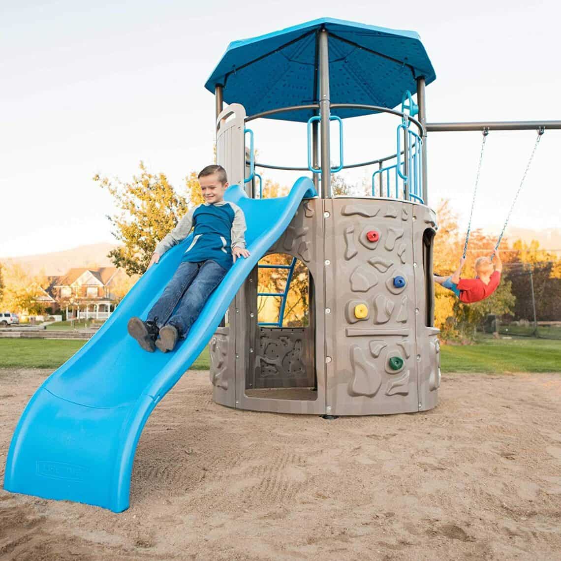 19 Outdoor Swing Sets That Will Make You Want To Be A Kid