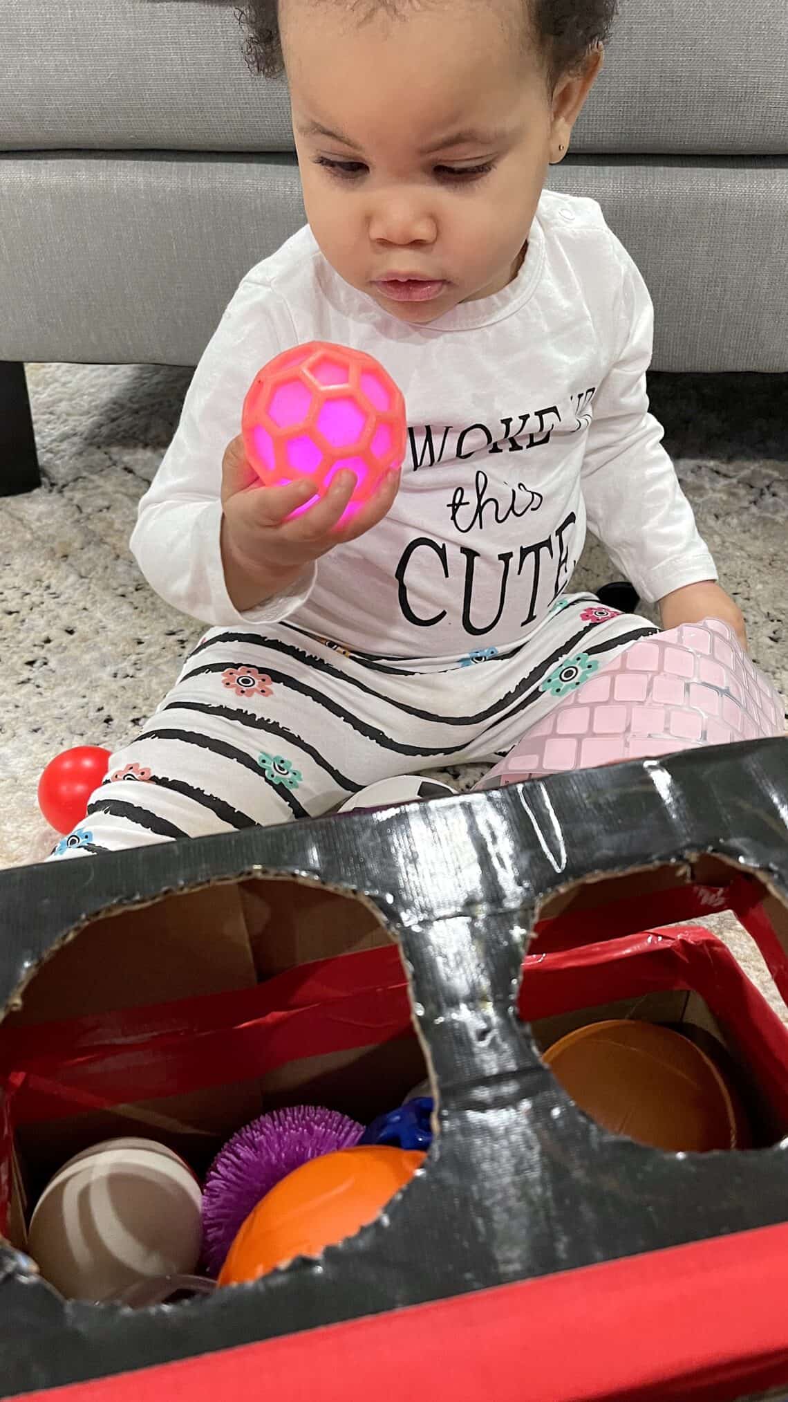 A Super Easy Baby Ball Drop Activity Your Child Will Love